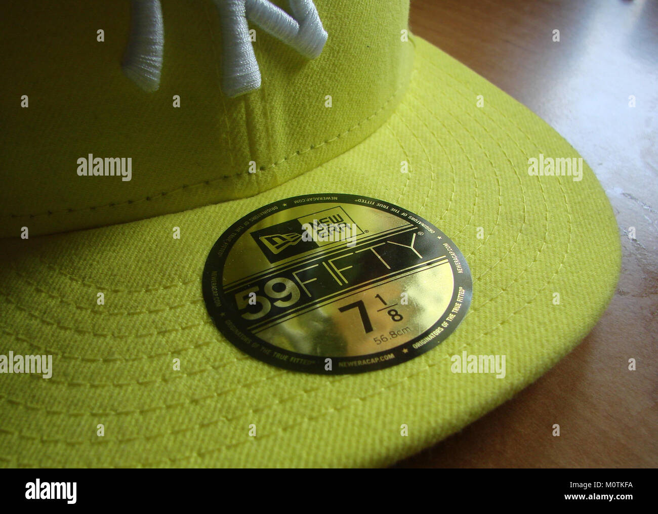 Cap brim sticker Stock Photo - Alamy