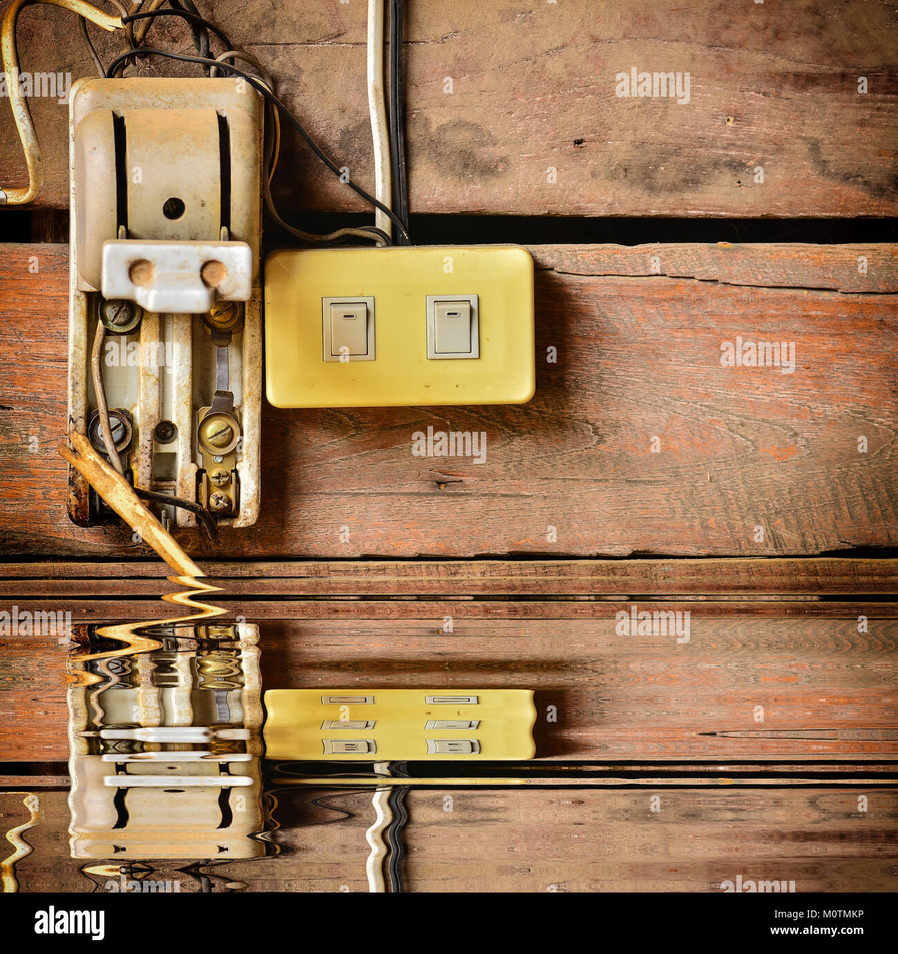 Old and damaged plug socket in vintage light near water poor Stock ...