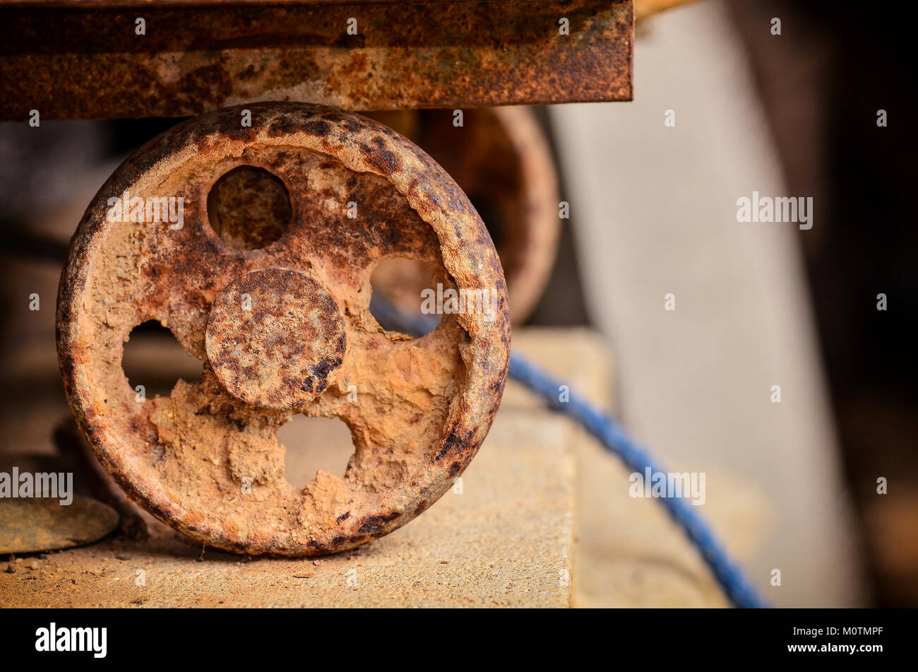 Old rusty Slide door with wheel Stock Photo - Alamy