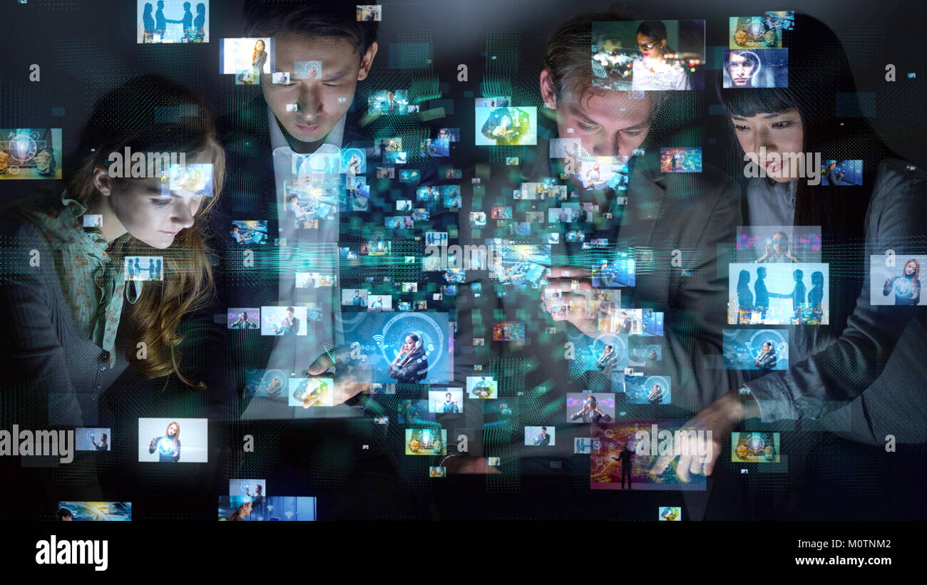 Group of people watching many pictures Stock Photo - Alamy