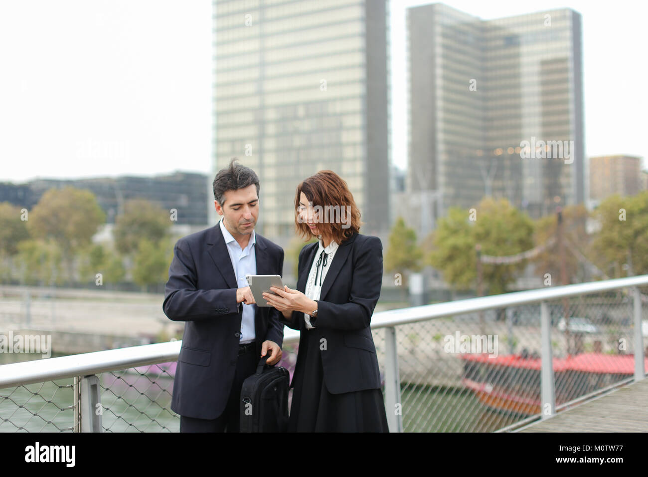 Married business couple make purchases by credit card Stock Photo - Alamy