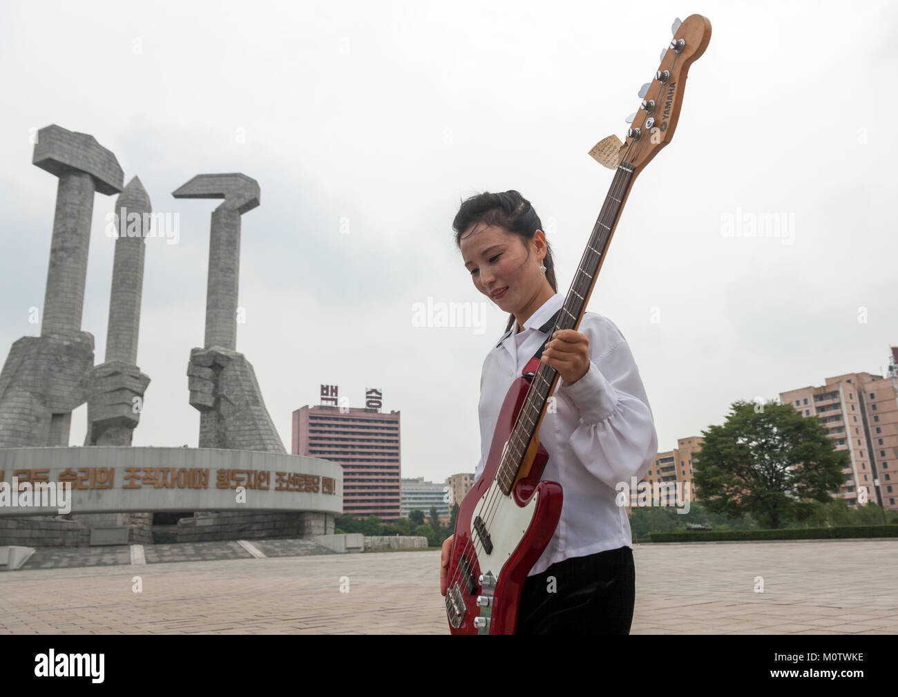 North Korean state artist performing on national day in front of the ...