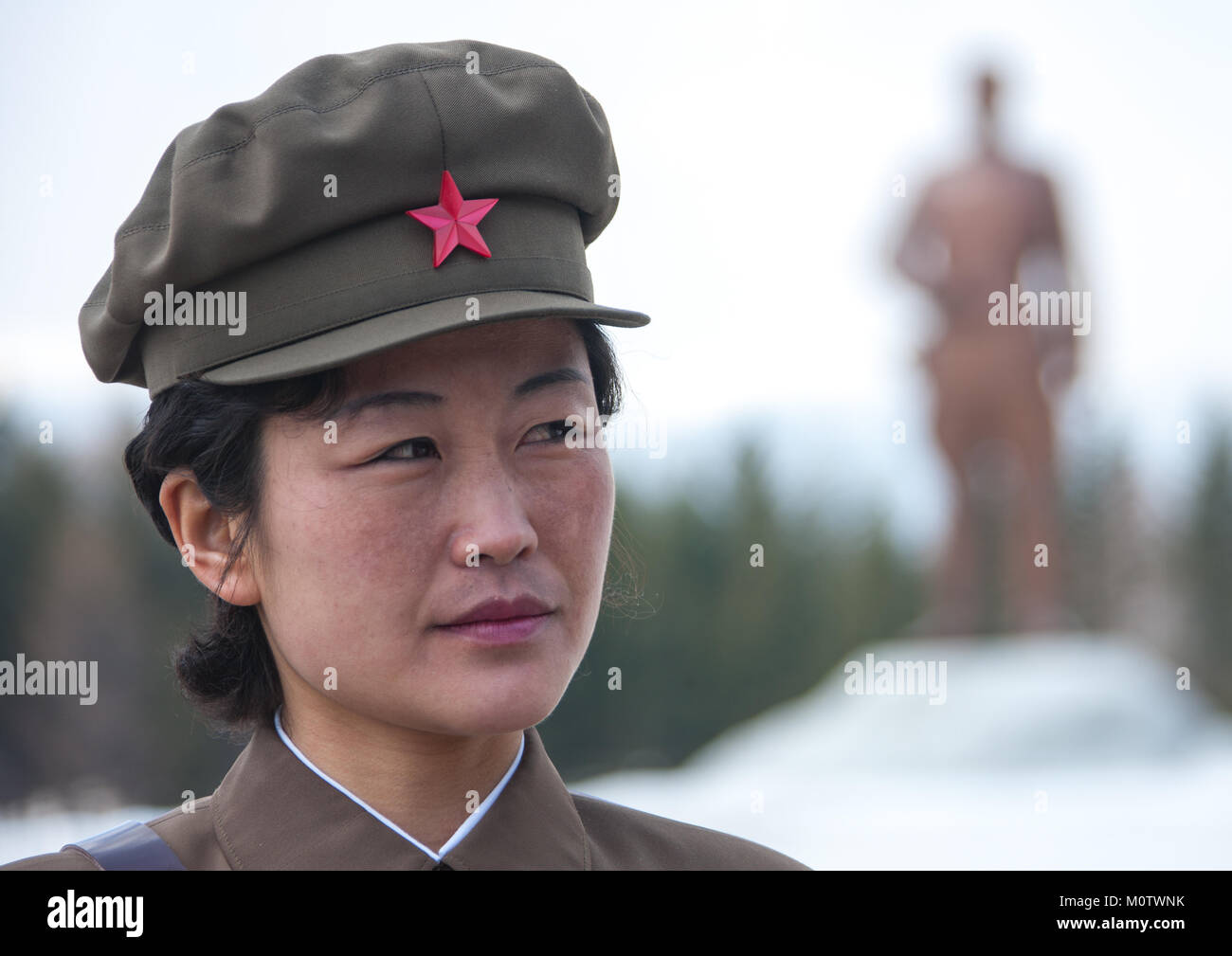 North Korean guide in the Grand monument of lake Samji, Ryanggang ...