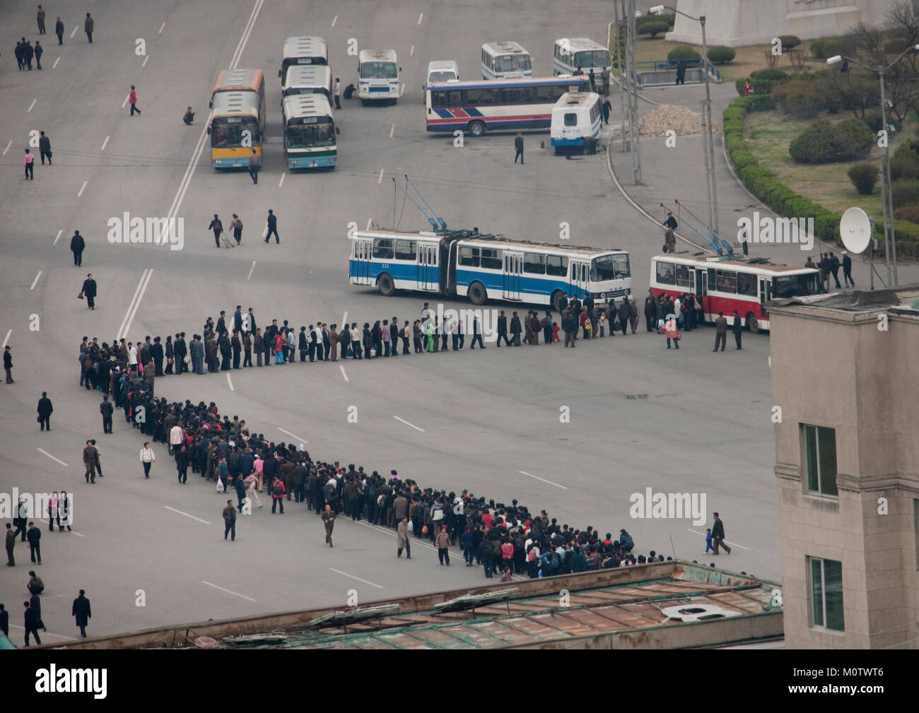 Crowd of North Korean people queueing in line for a bus , Pyongan ...