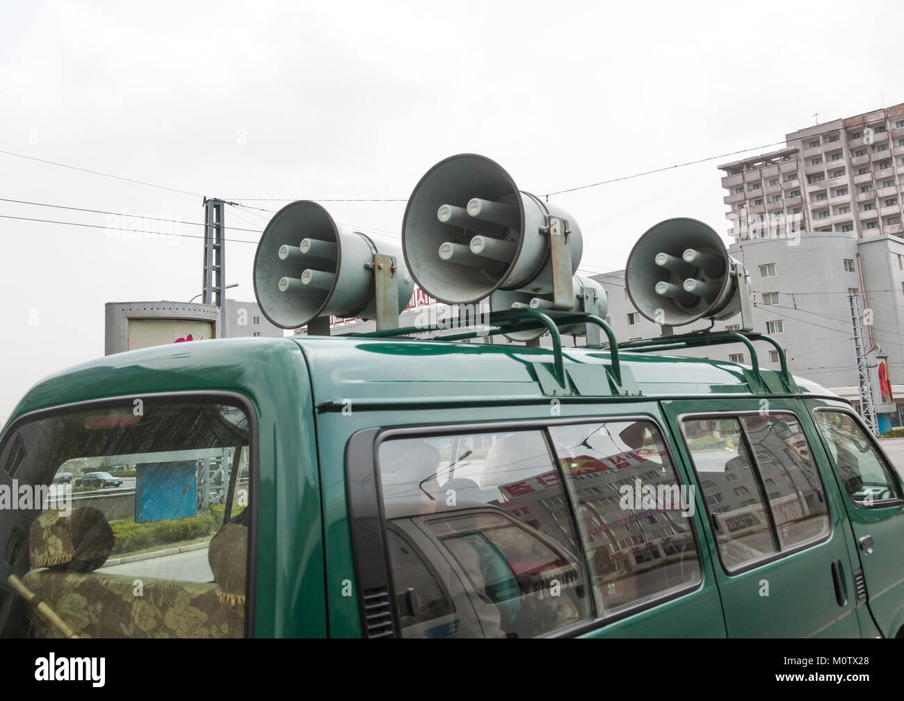 Propaganda car with loudspeakers on the roof in the street, Pyongan ...