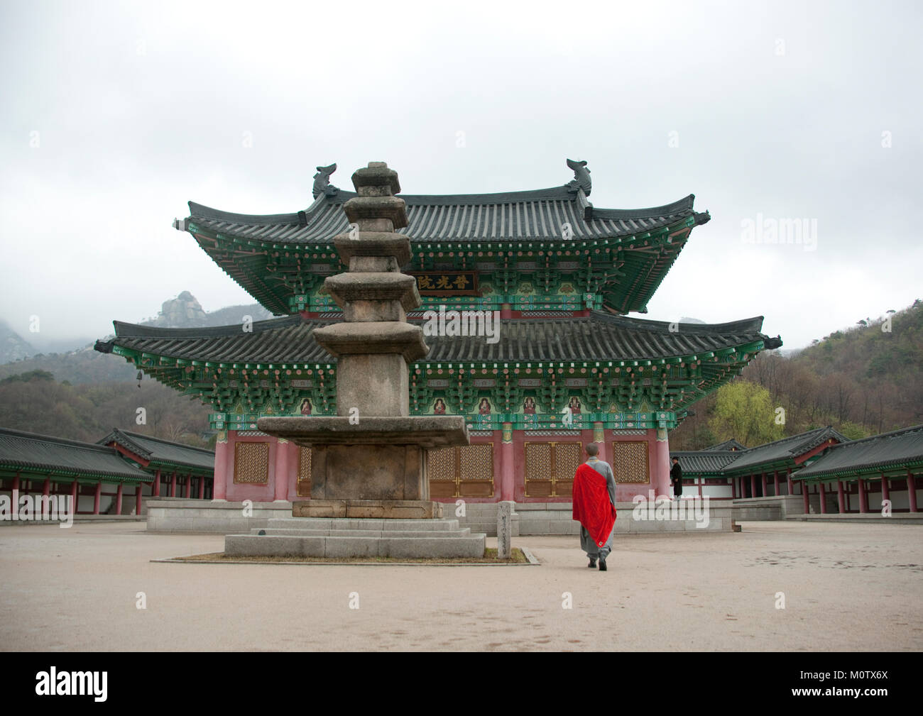 North Korean monk in front of Ryongthong temple founded by Korean ...