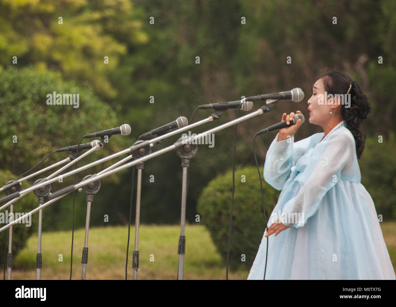 North Korean state artist singing on national day, Pyongan Province ...