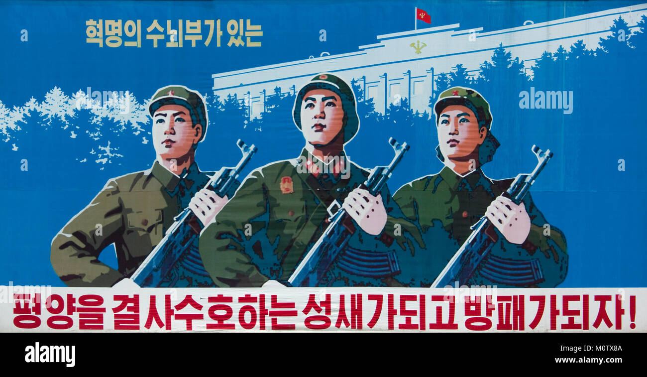 North Korean propaganda billboard depicting soldiers with guns, Pyongan ...
