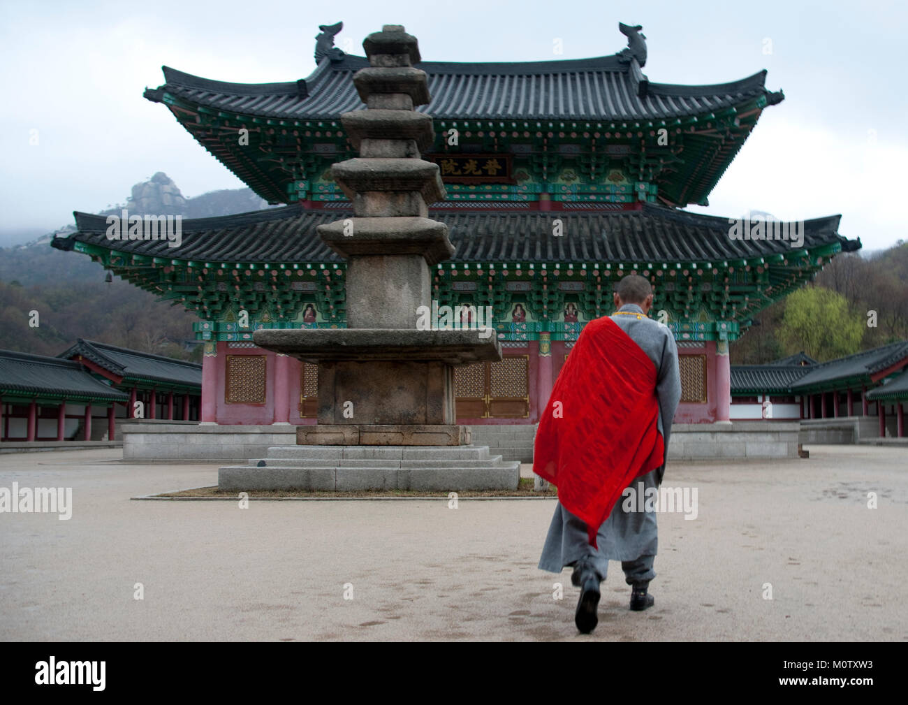 North Korean monk in front of Ryongthong temple founded by Korean ...
