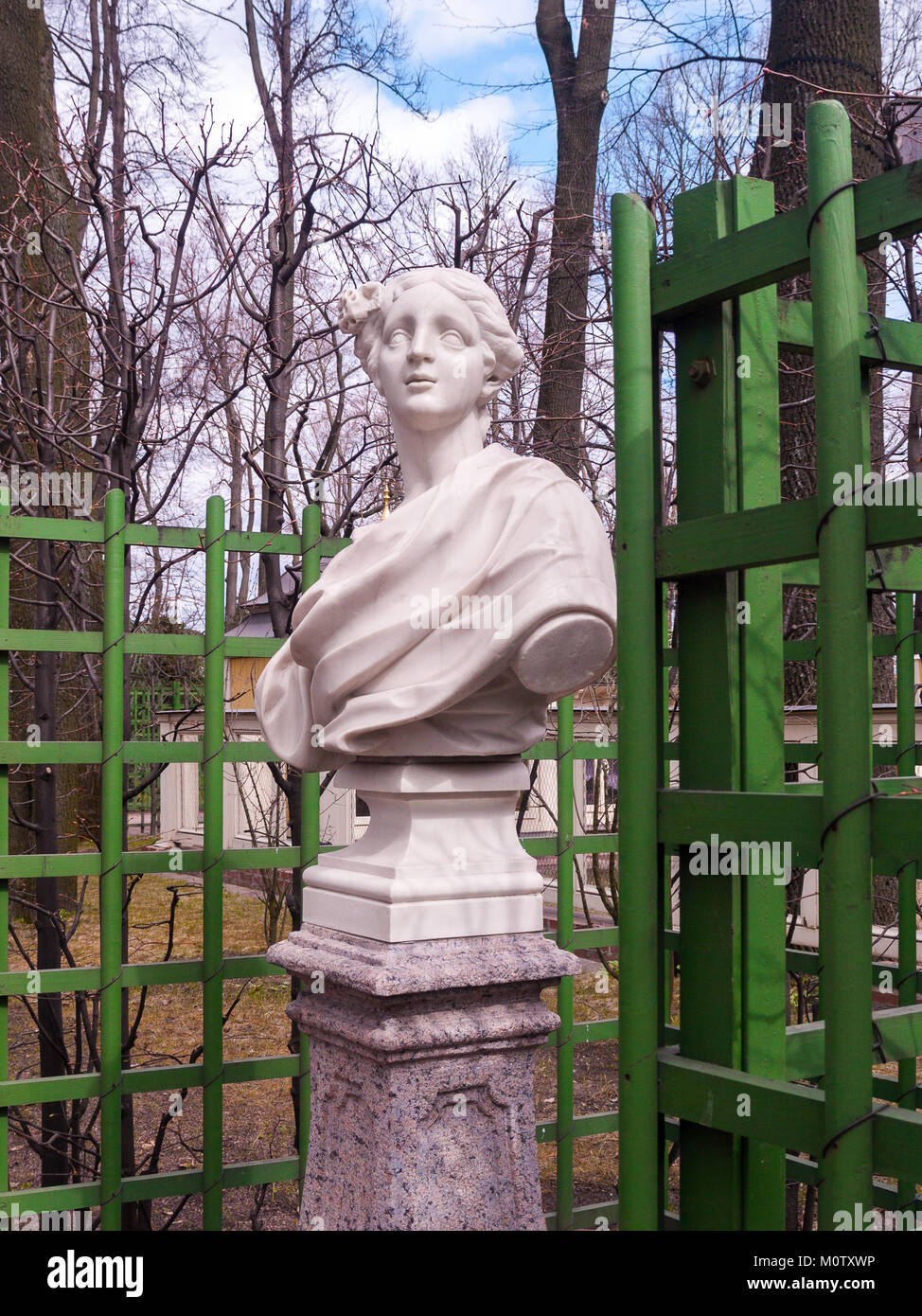 Bust sculpture allegory of spring in the park Summer garden near the ...