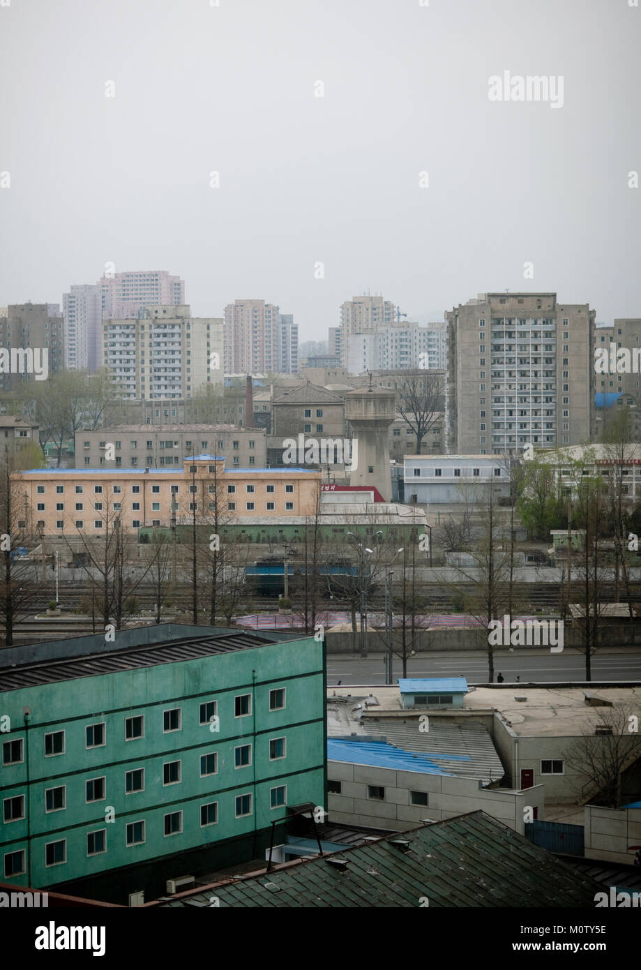 Train station in front of buildings in the city center, Pyongan ...