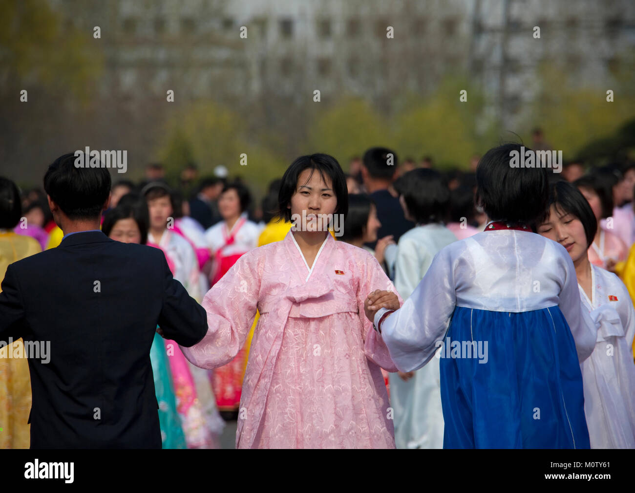 North Korean young adults during a mass dance performance in front of ...