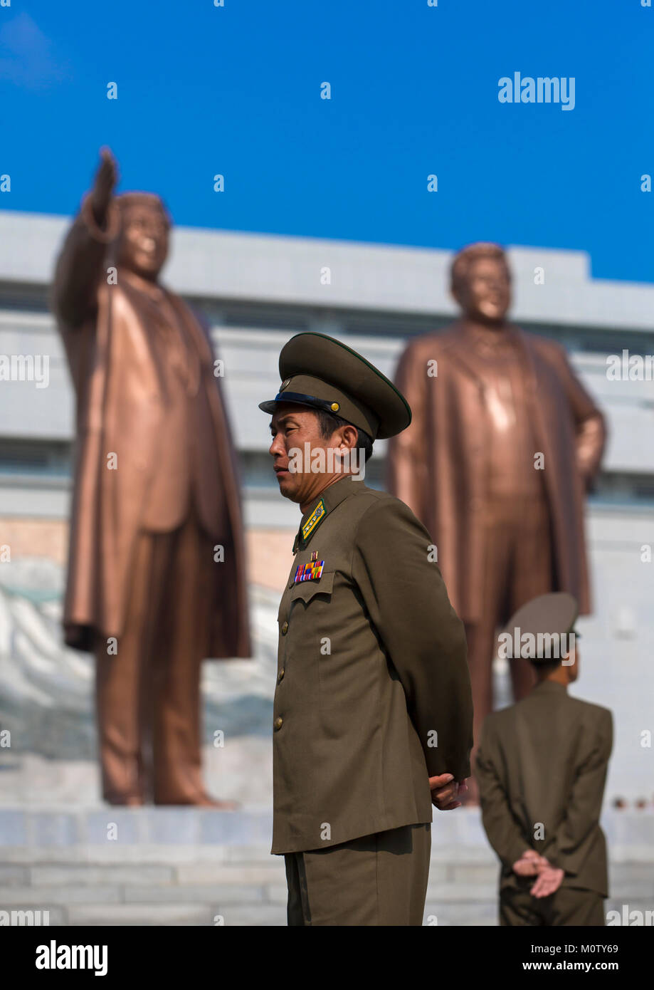 North Korean soldiers in front of the two statues of the Dear Leaders ...