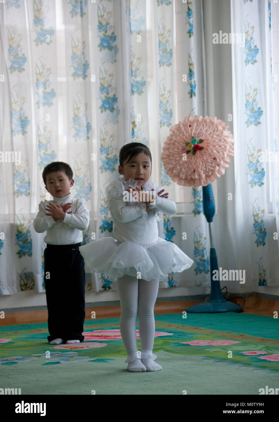 Young couple of North Korean ballet dancers children in Kim Jong suk ...