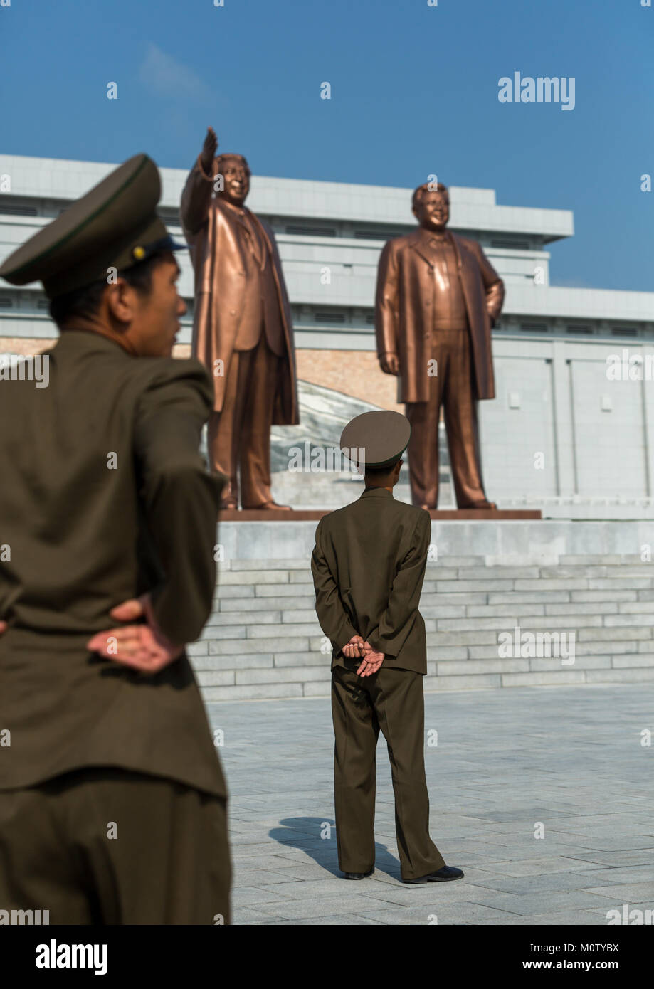 North Korean soldiers in front of the statues of the Dear Leaders in ...