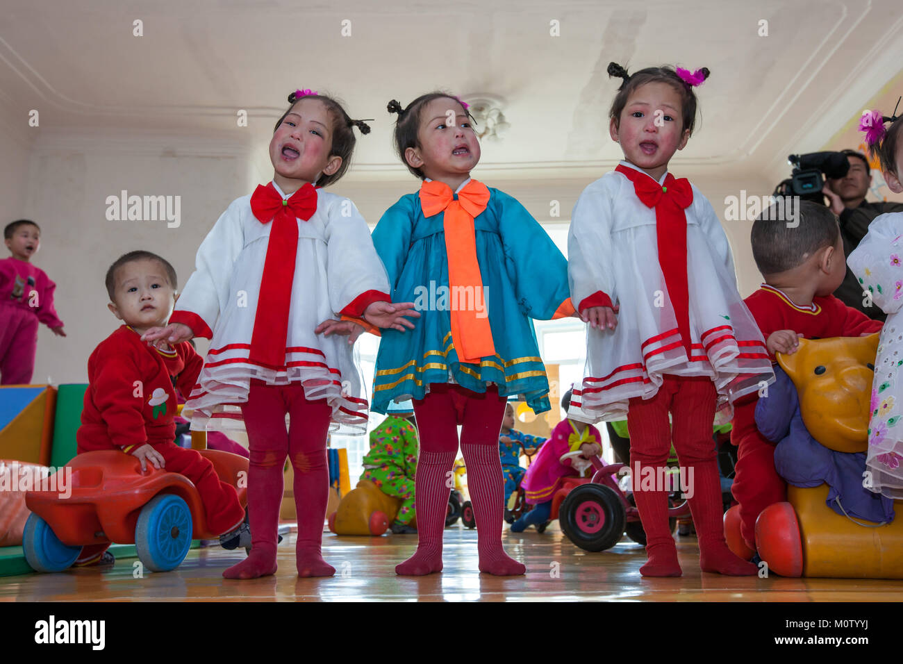 North Korean triplets girls singing in an orphanage, South Pyongan ...