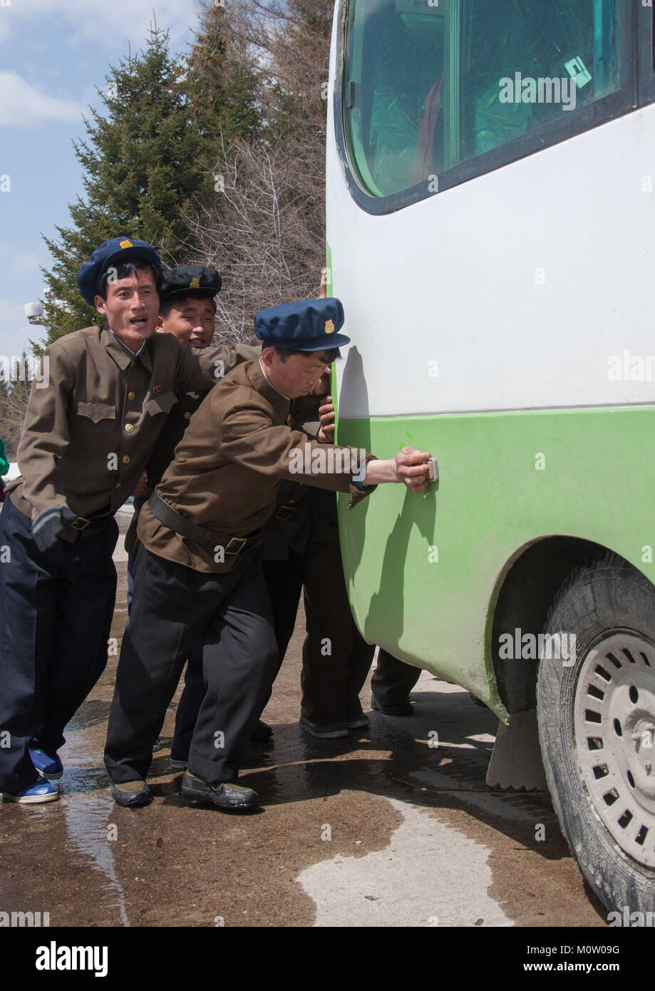Students pushing bus High Resolution Stock Photography and Images - Alamy