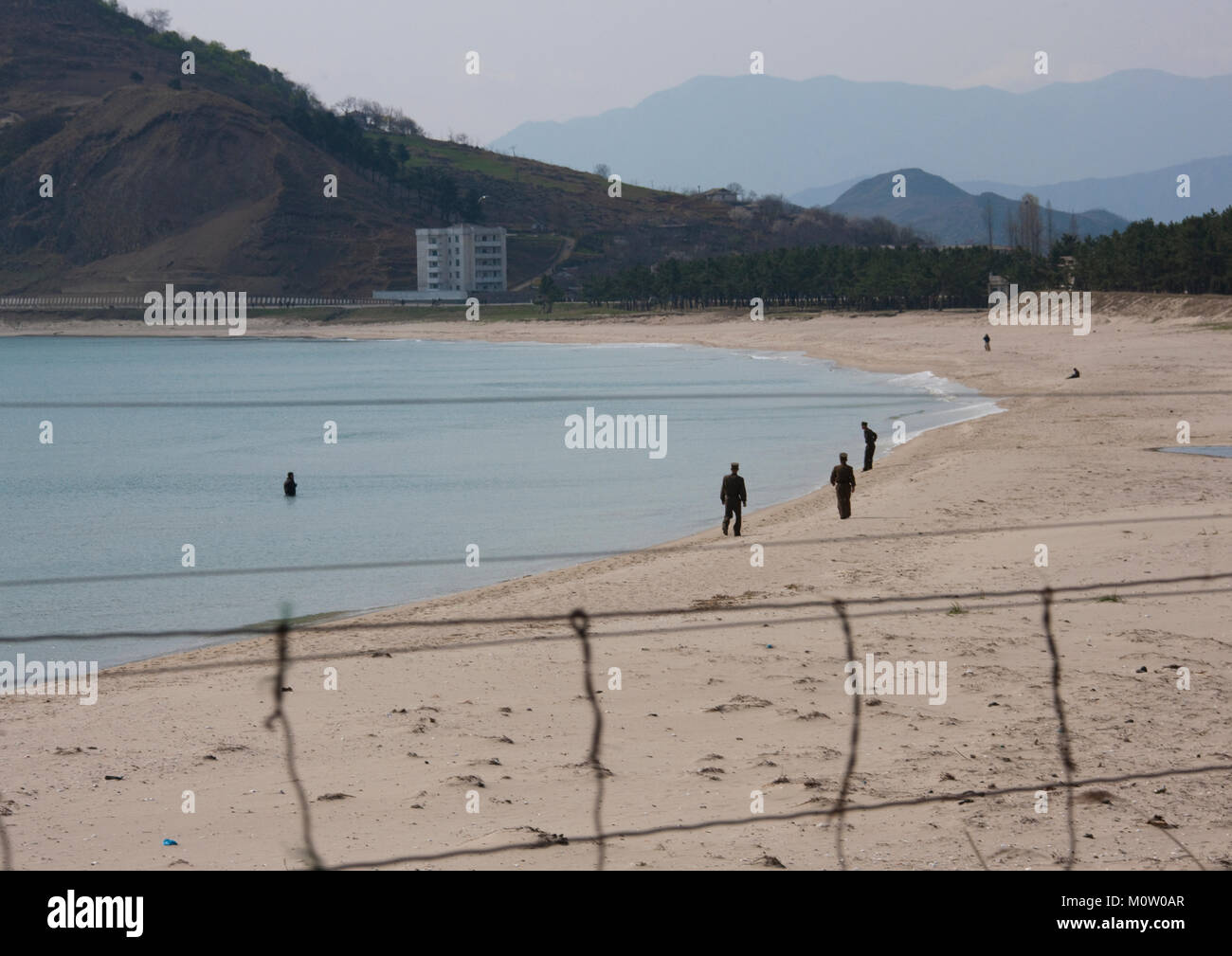North Korean soldiers walking on a beach in the east sea, Kangwon ...