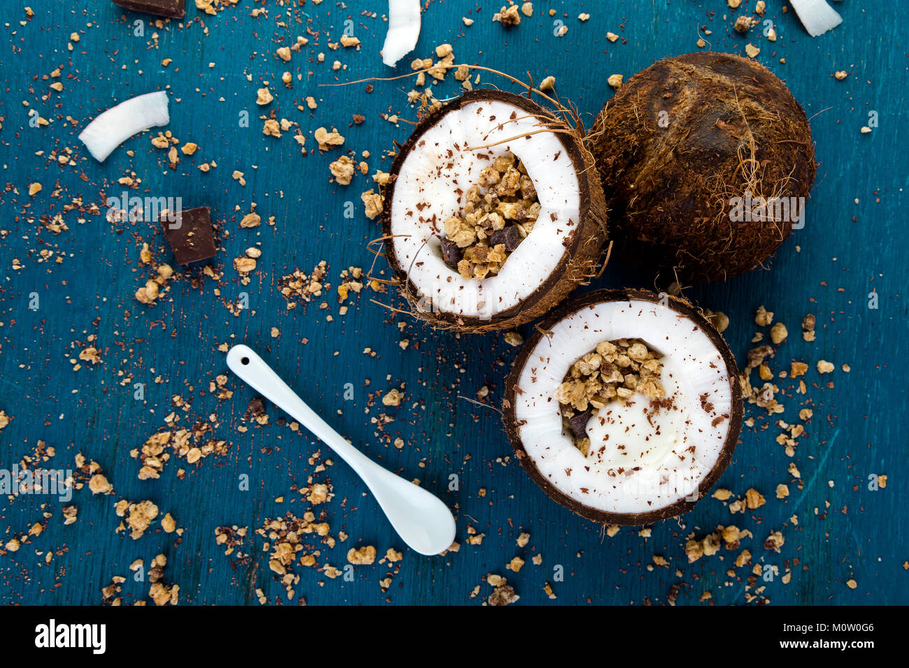 Healthy breakfast in coconut bowl. Yogurt in coconut bowl with coconut ...