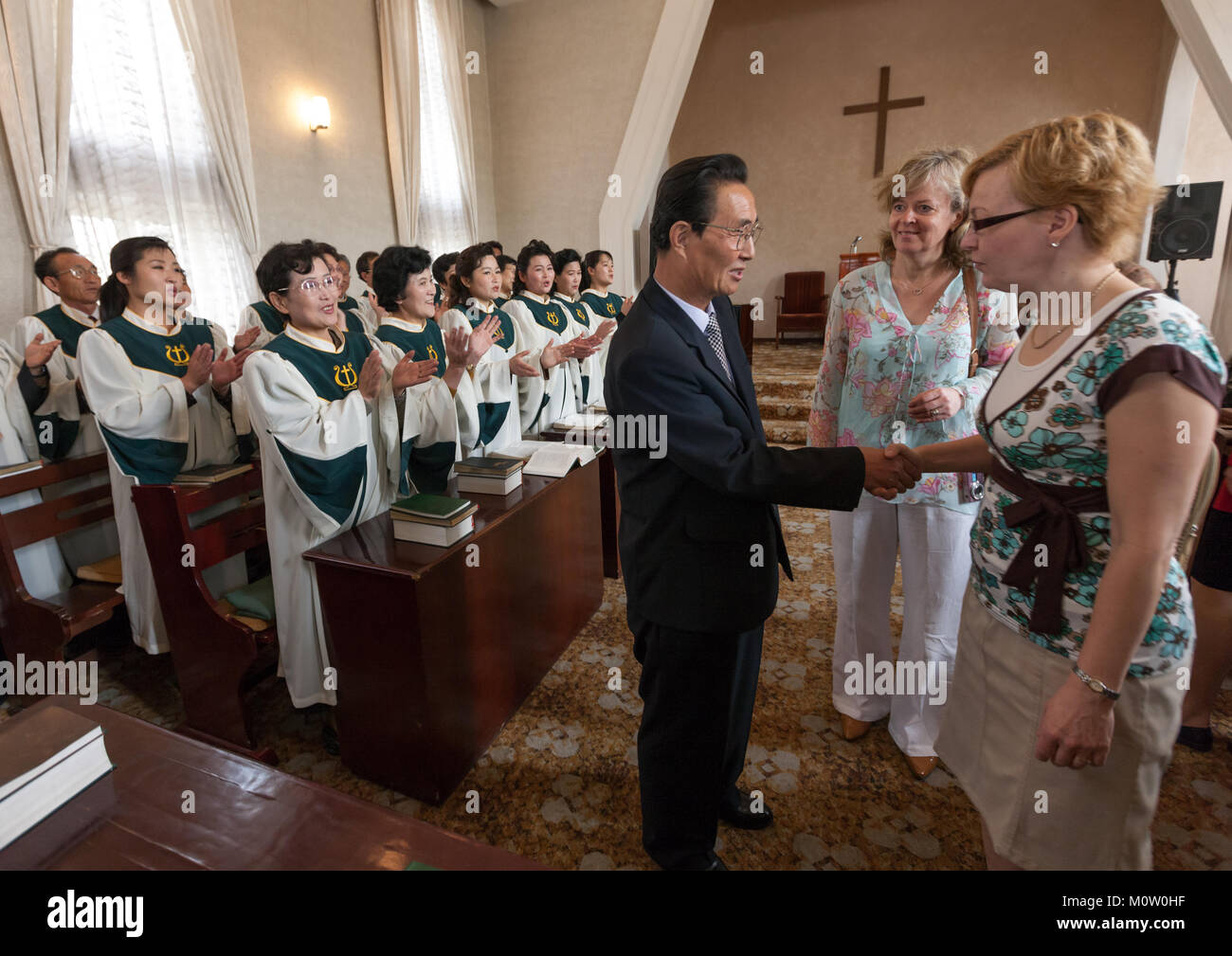 Tourists visiting the Chilgol protestant church, Pyongan Province ...