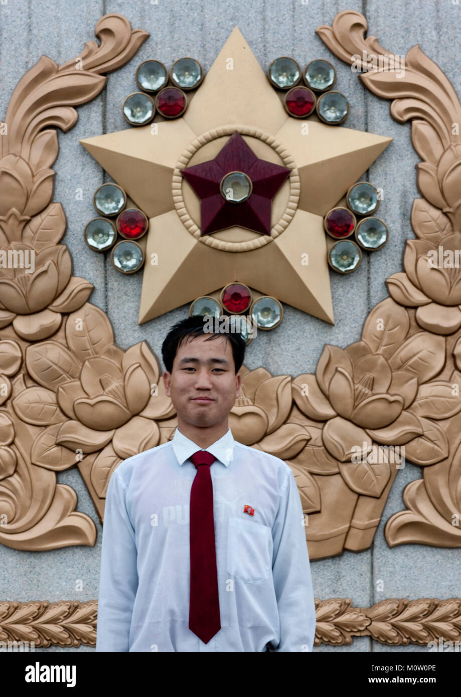 North Korean man under the rain in Kumsusan memorial palace posing in ...