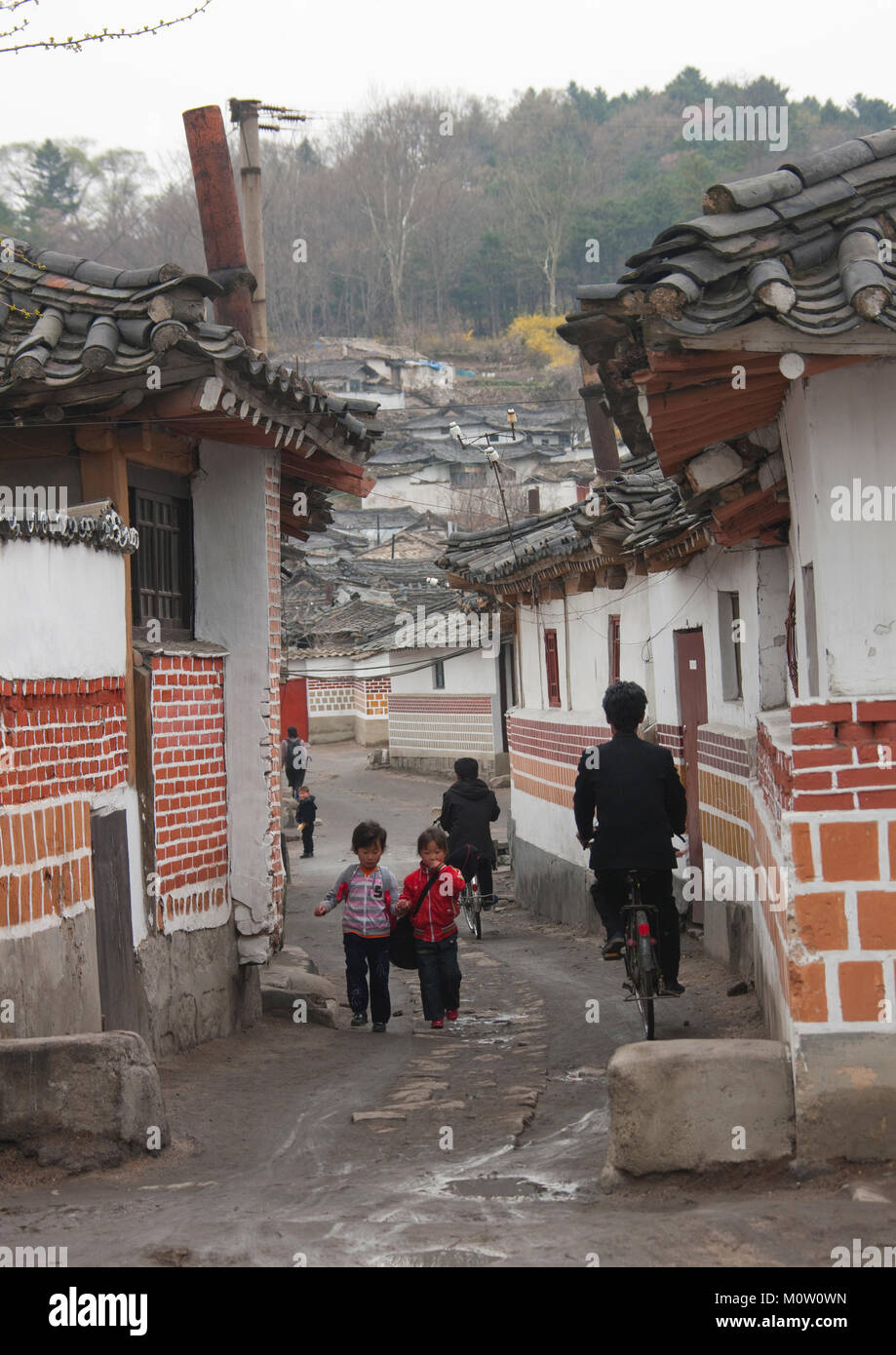 North Korean people walking in a street in the old town, North Hwanghae ...