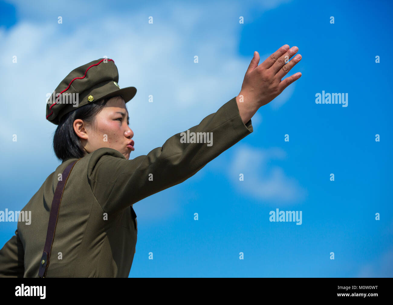 North Korean female soldier giving instructions, Pyongan Province ...