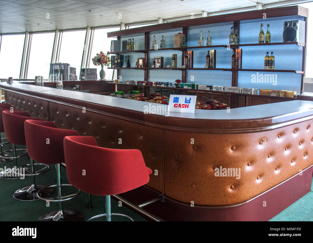 Empty bar in Yanggakdo international hotel with a cash billboard ...
