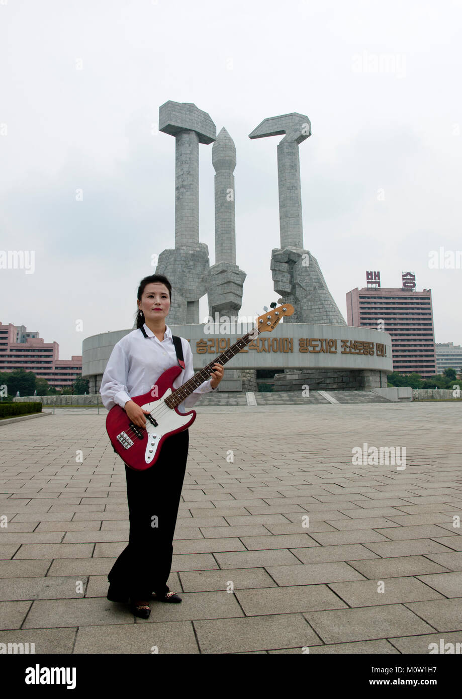 North Korean state artist bassist on national day in front of the ...