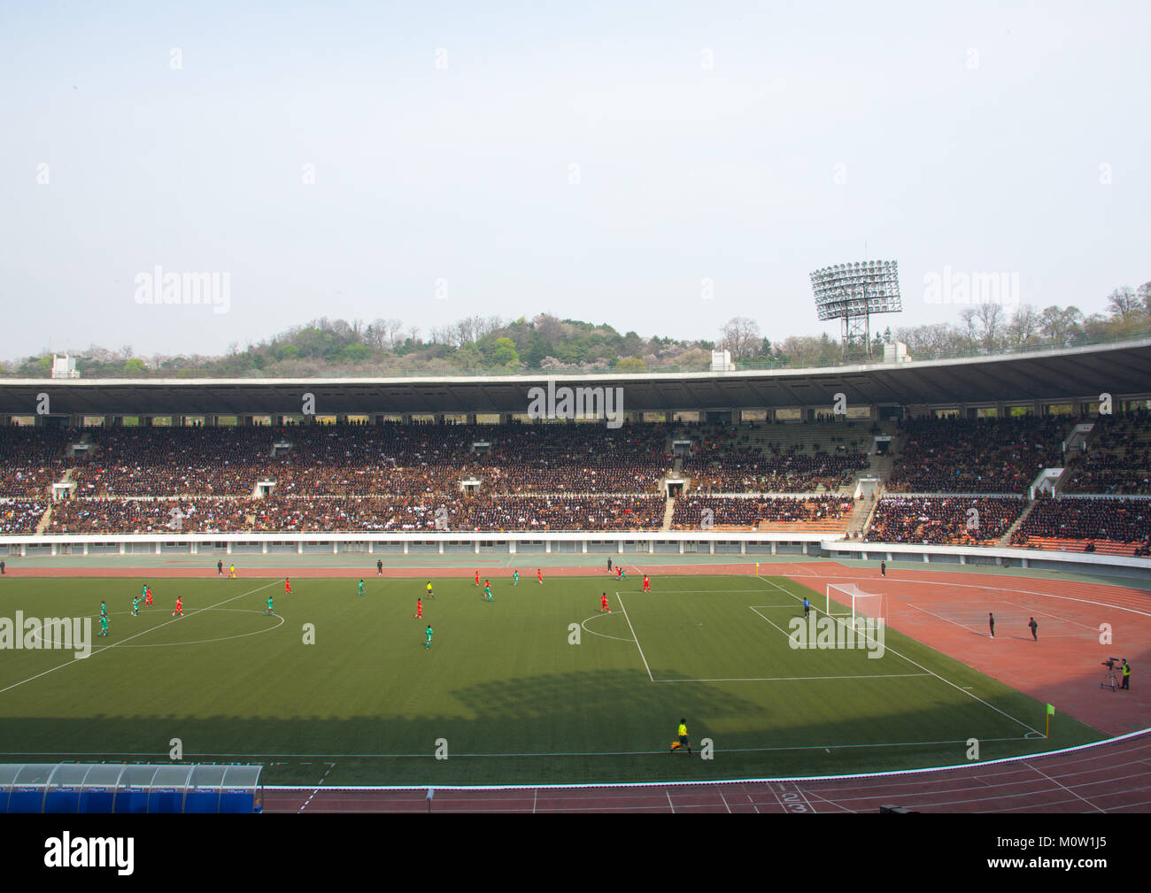 Crowd in the Kim il Sung stadium during a football game, Pyongan ...
