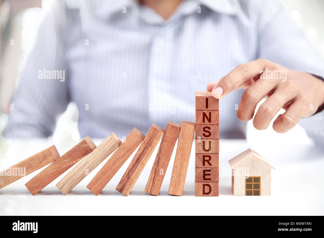 businessman and home model, insurance concept Stock Photo - Alamy