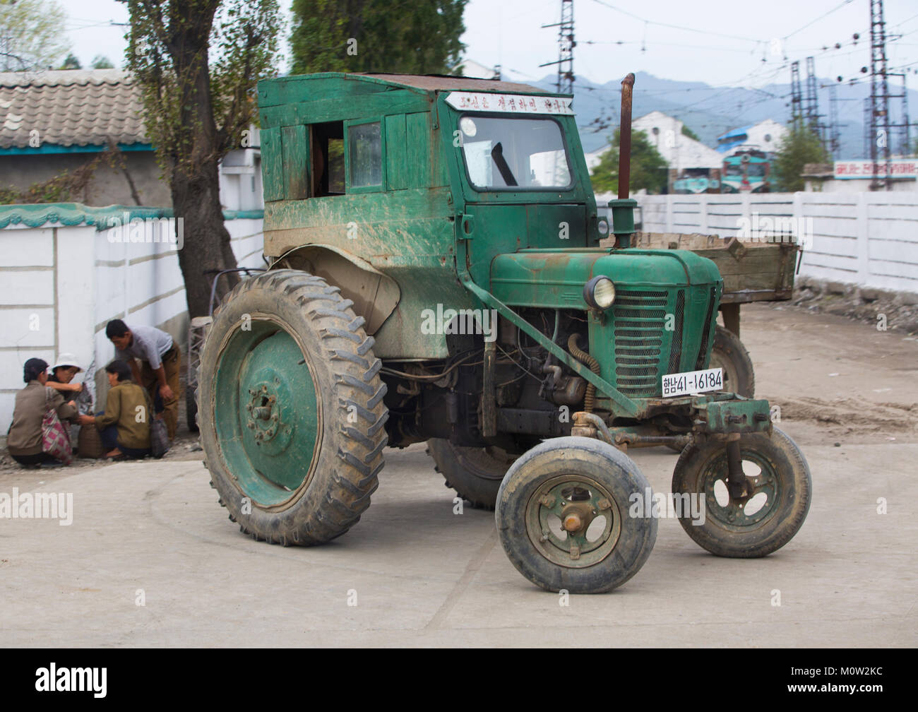 Old green North Korean tractor in the countryside, South Hamgyong ...