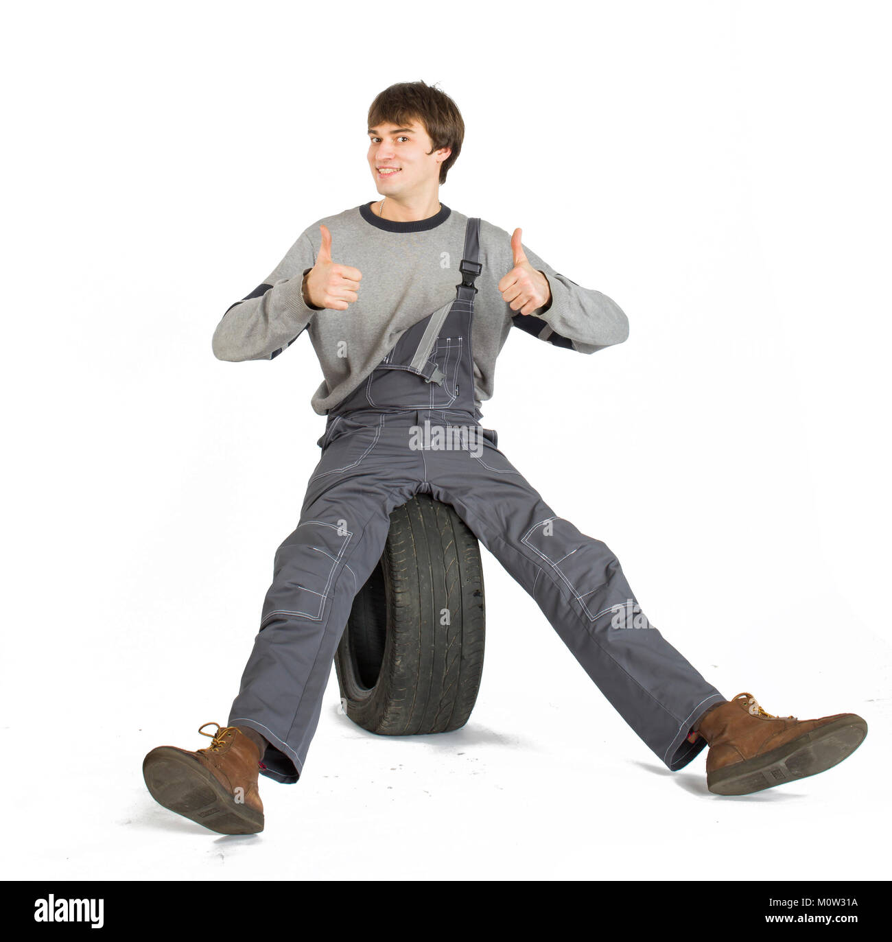 Car mechanic working in repair garage Cut Out Stock Images & Pictures ...