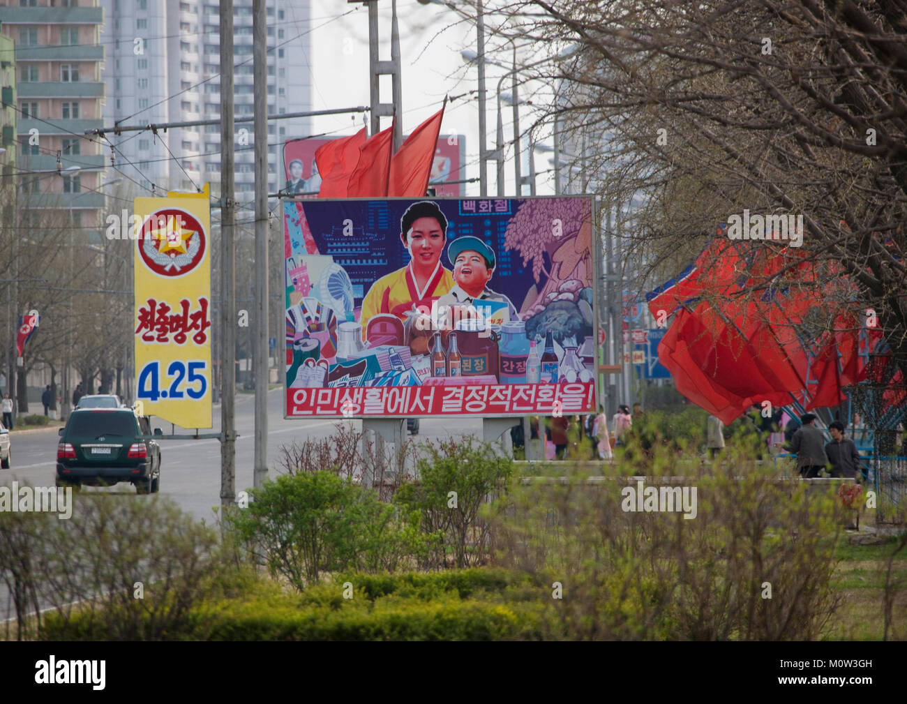 Propaganda billboard on a road encouraging consumers to buy, Pyongan ...