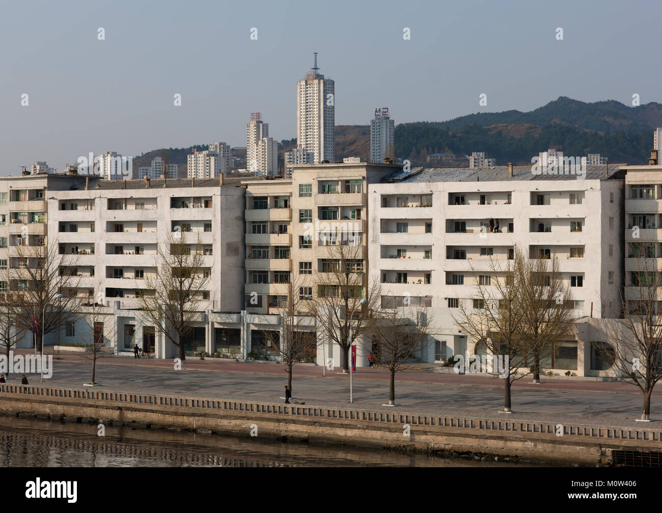 City buildings on the river, Kangwon Province, Wonsan, North Korea ...