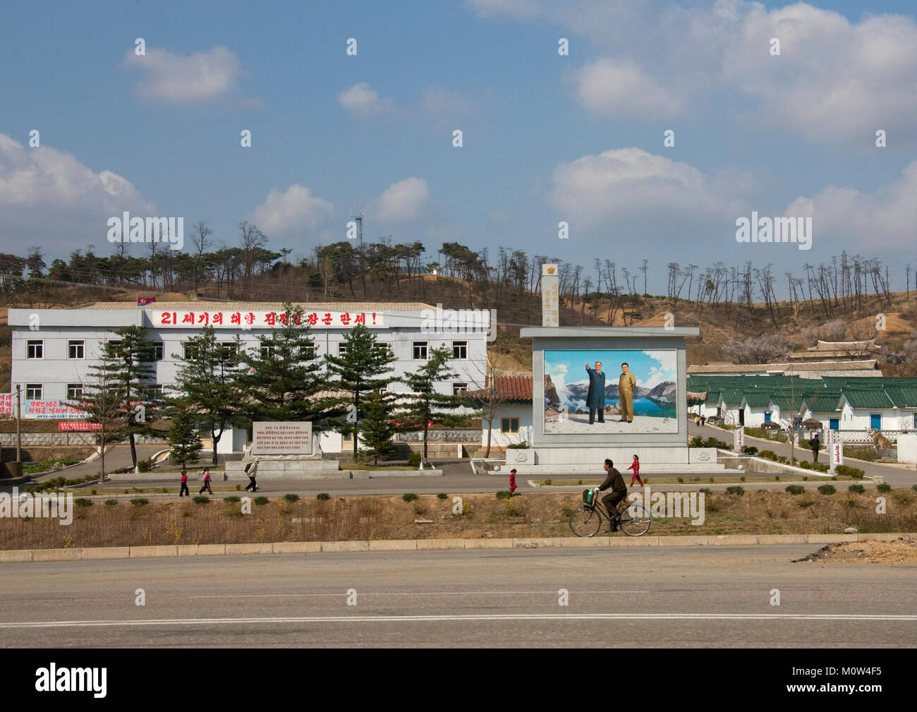 The Dear Leaders fresco at the entrance of a village, Pyongan Province ...