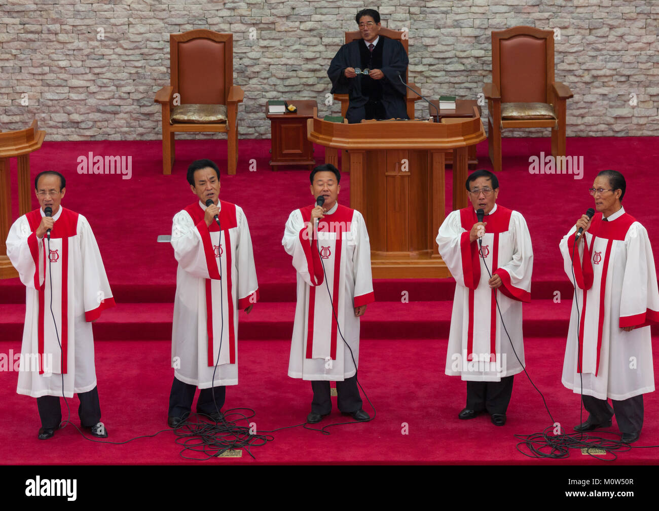 North Korean men singing in protestant Bongsu church, Pyongan Province ...