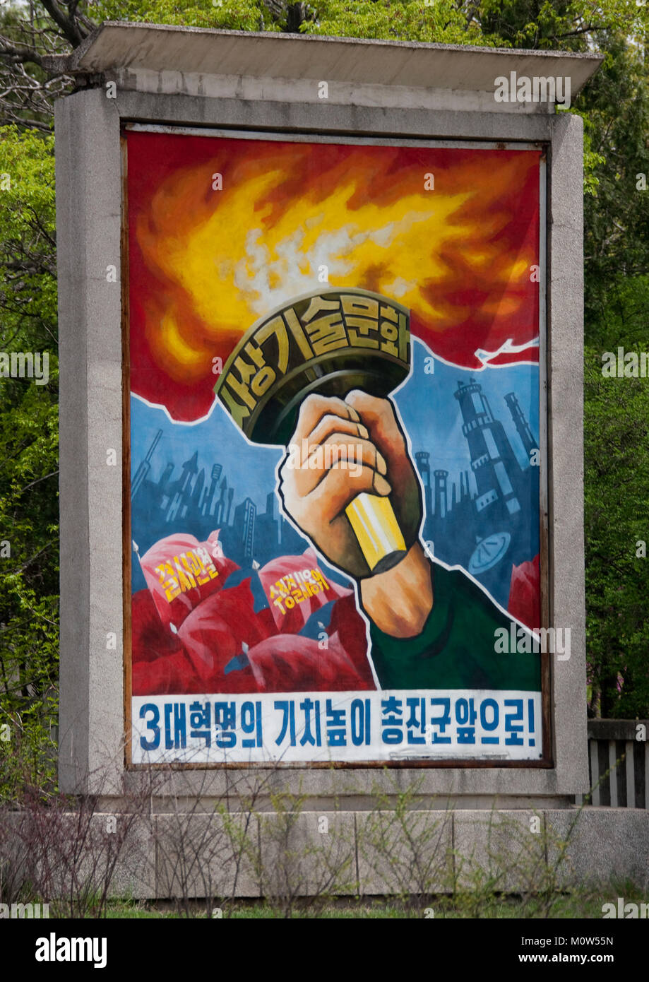 Propaganda billboard depicting the Juche tower flame, Pyongan Province ...
