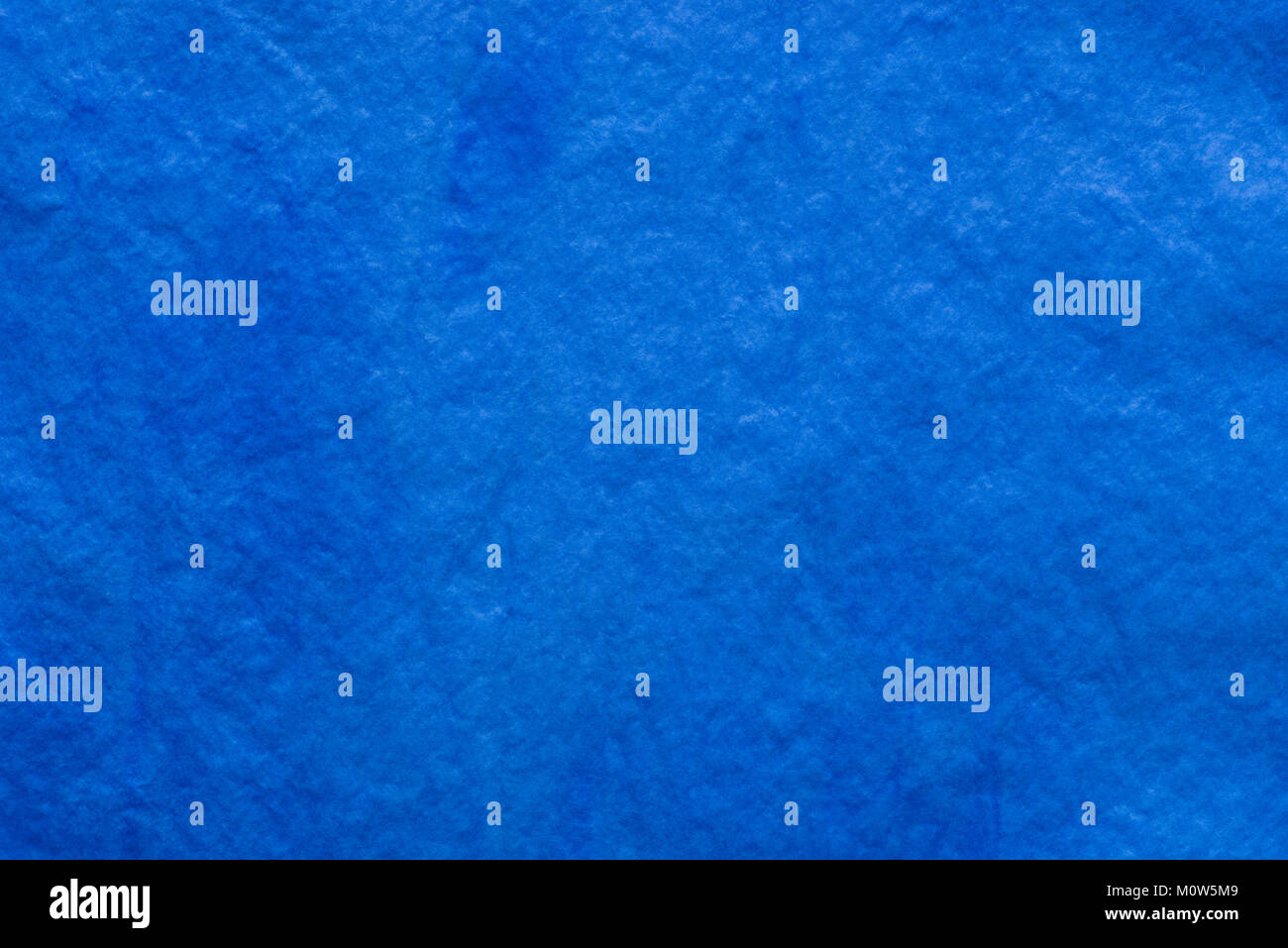 blue color creased tissue paper bacground texture Stock Photo - Alamy