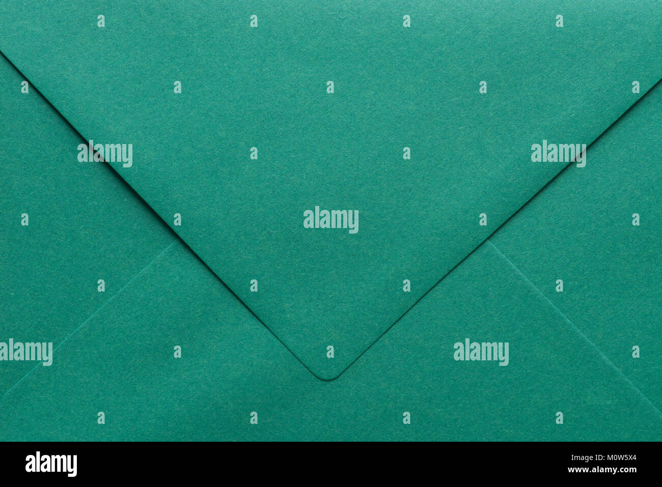green color empty envelope macro background Stock Photo - Alamy