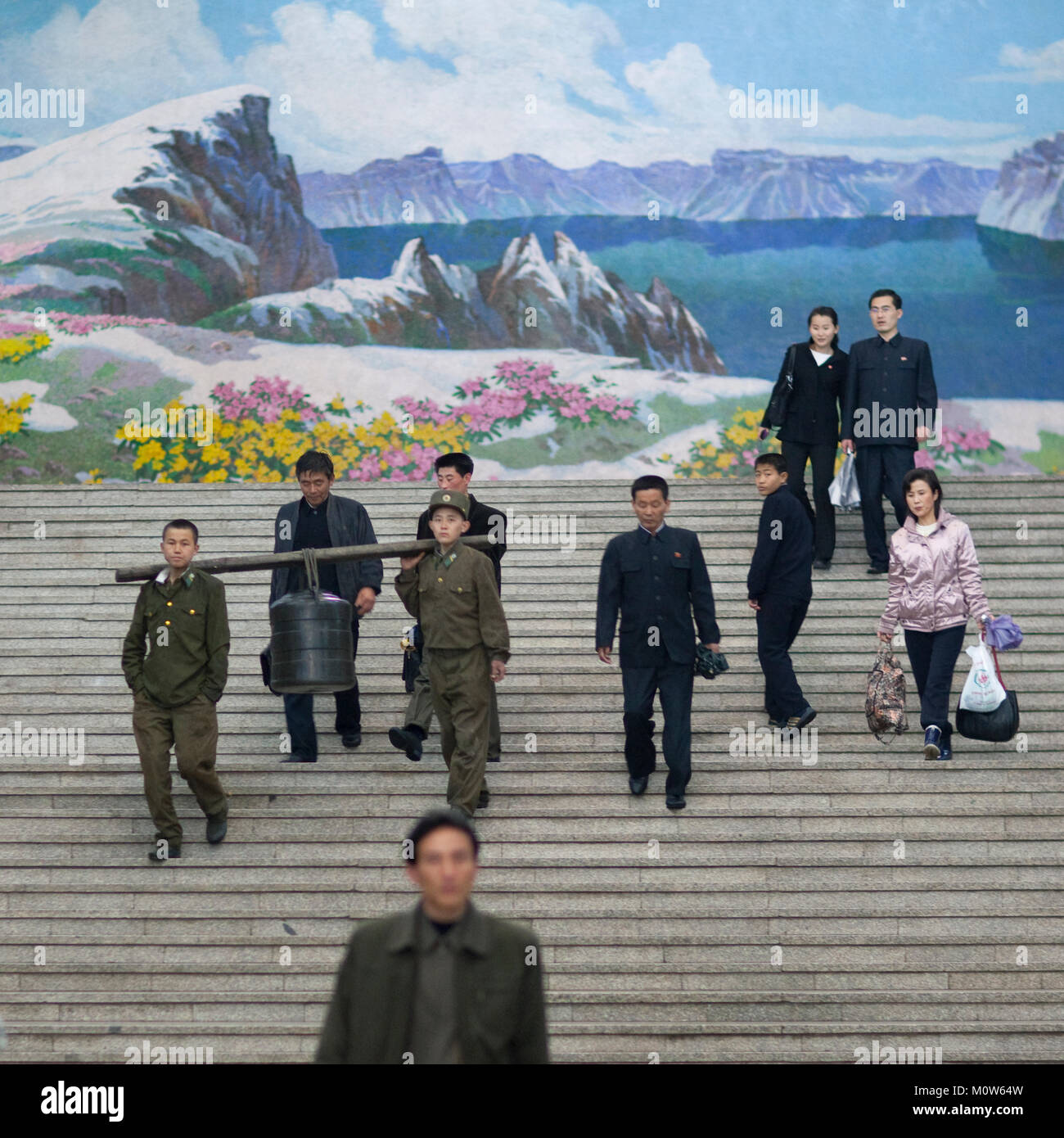 North Korean people entering Yonggwang metro station in frot of a mount ...