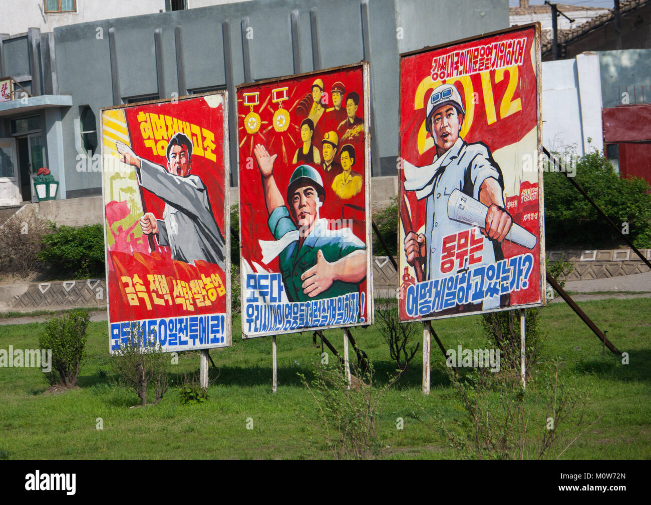 Row of North Korean propaganda billboards in the street, Pyongan ...