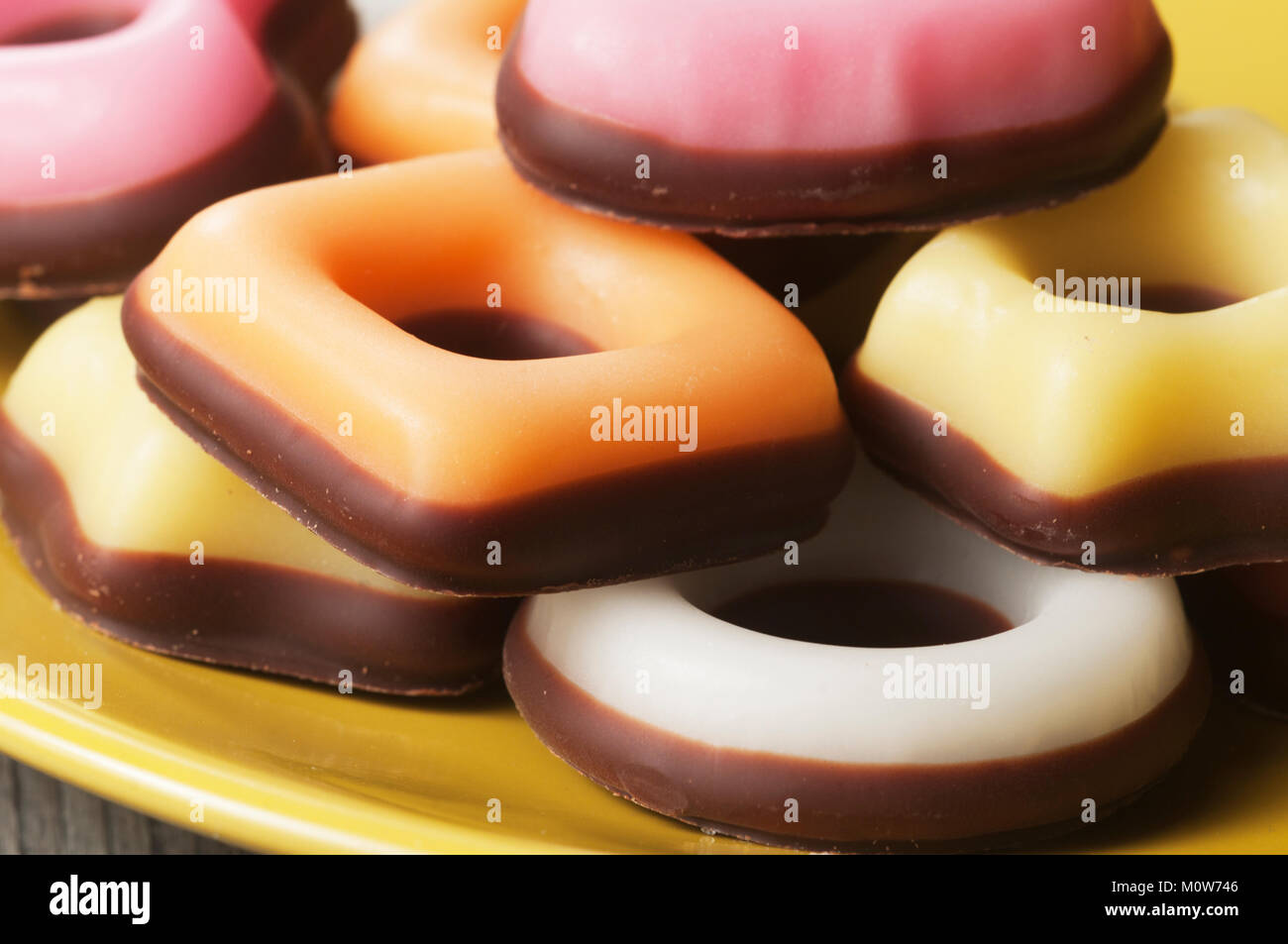 Donuts with icing and topping, close up shot Stock Photo - Alamy