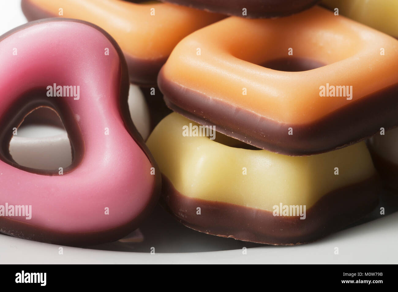 Donuts with icing and topping, close up shot Stock Photo - Alamy
