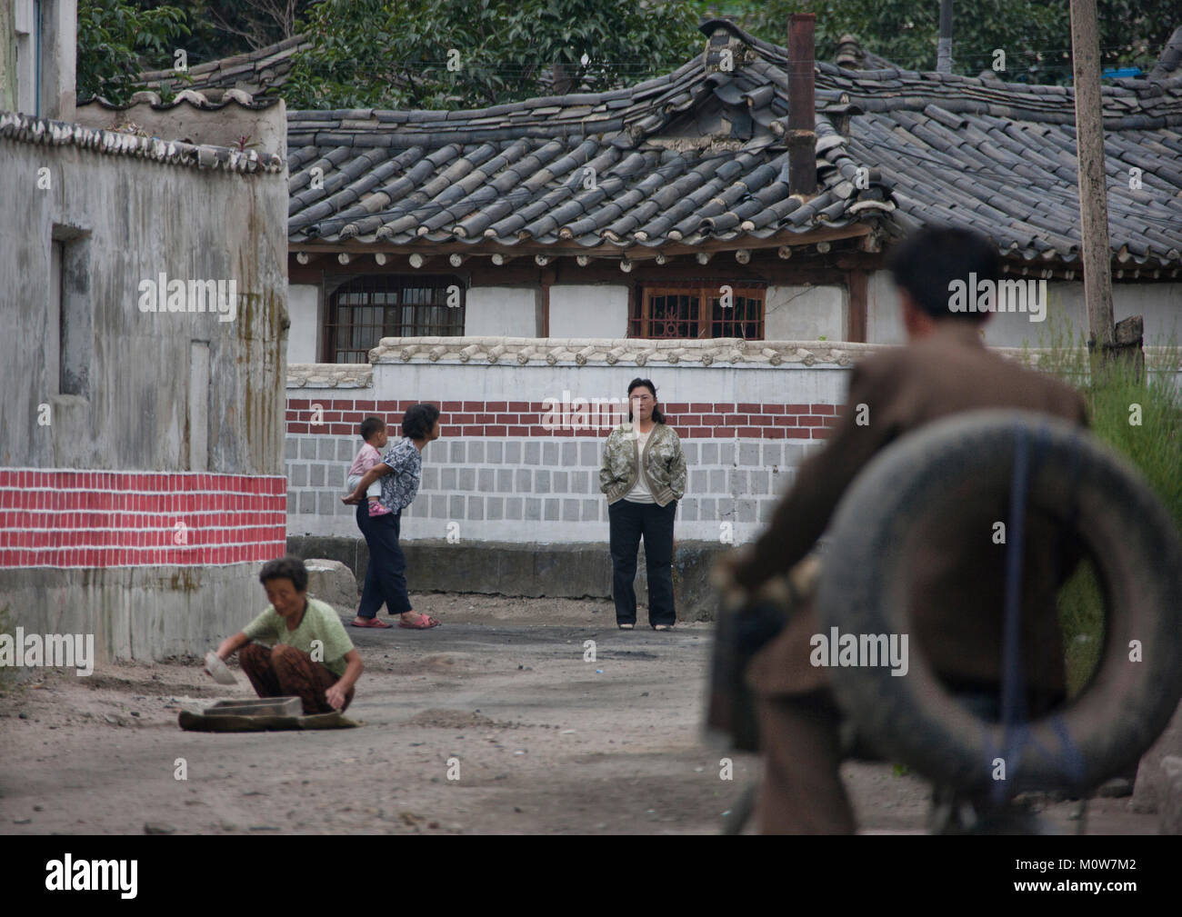 North Korean people in a street of the old quarter, North Hwanghae ...