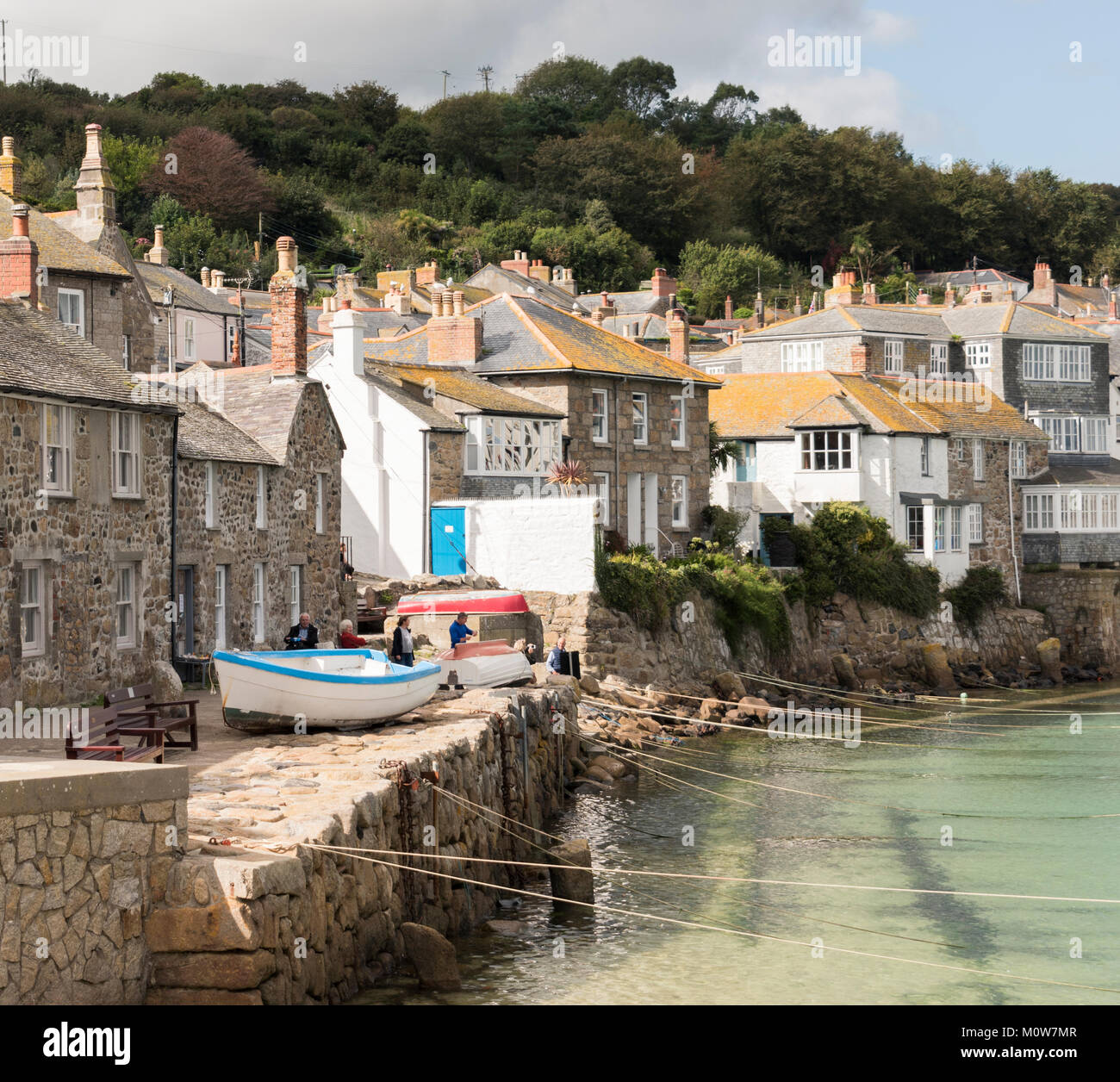Boats in the harbour of the pretty fishing village of Mousehole in ...