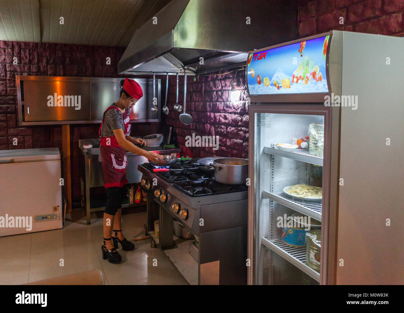 North Korean pizzeria cook in an italian restaurant, Pyongan Province ...