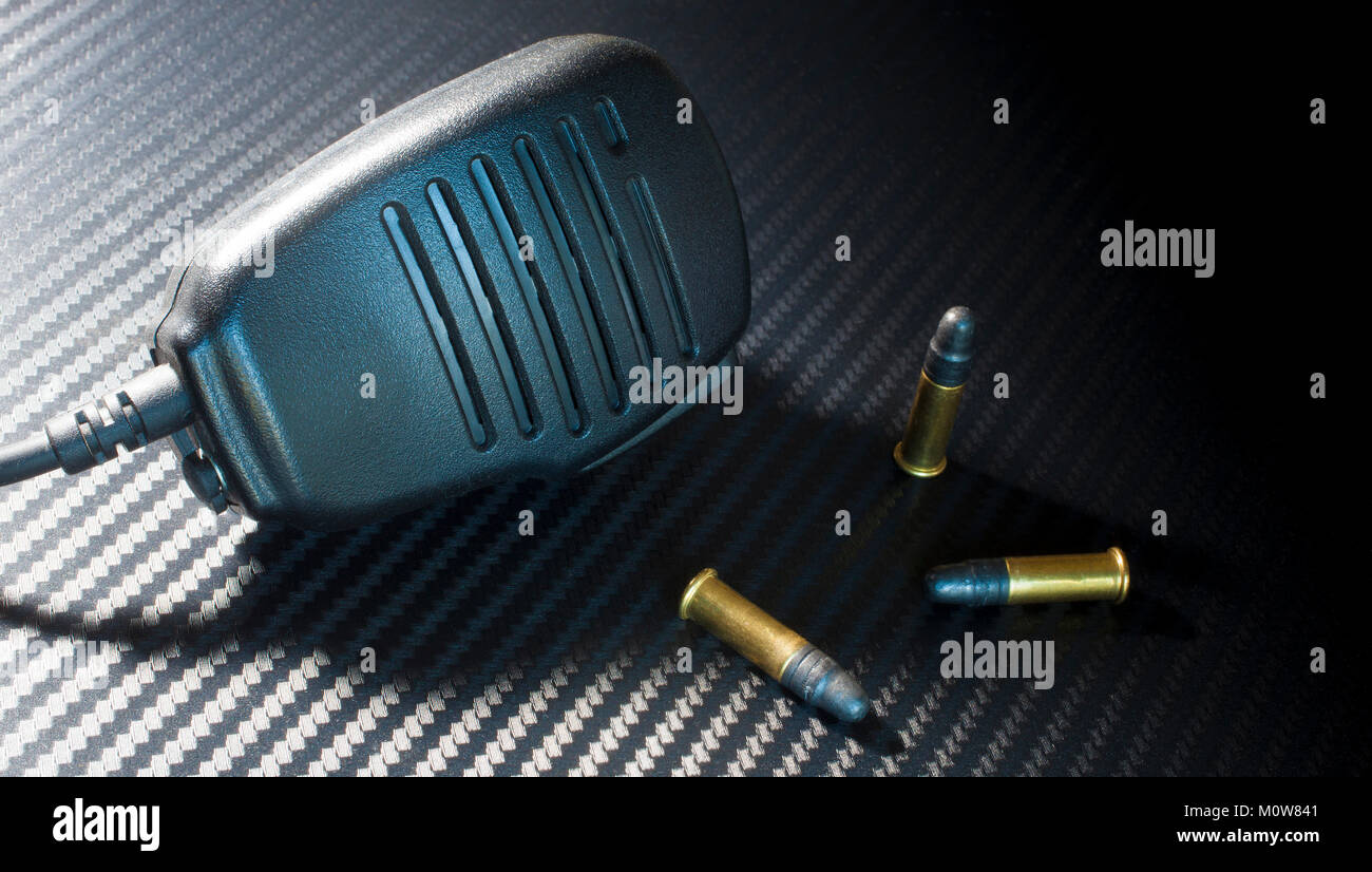 Police style microphone with three small bullets Stock Photo - Alamy