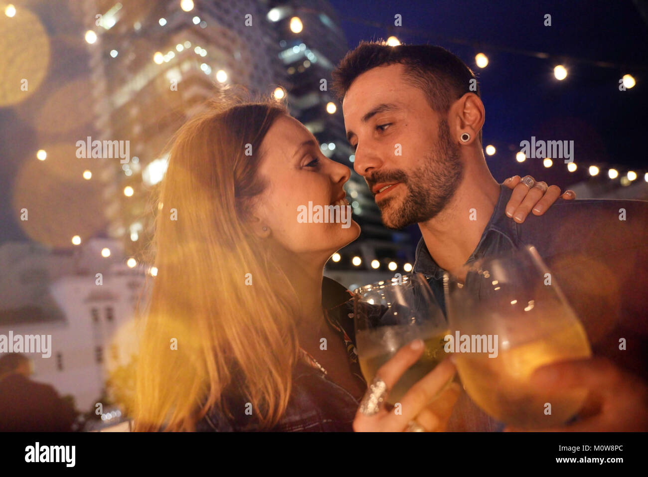 Romantic date at restaurant rooftop in Miami Stock Photo - Alamy