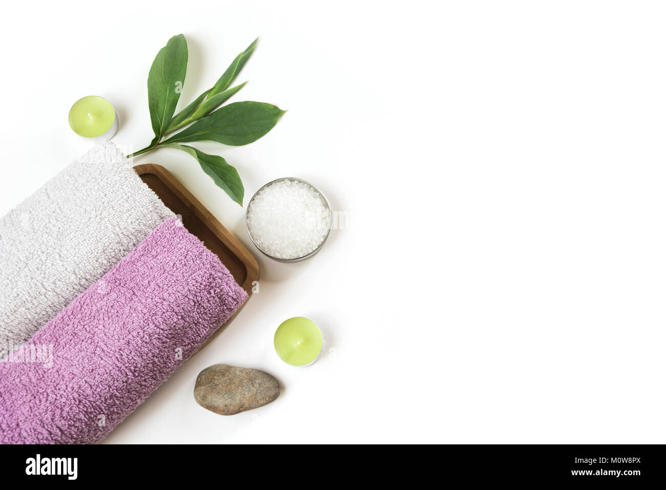 Spa setting on white background with copy space. Relax Stock Photo - Alamy